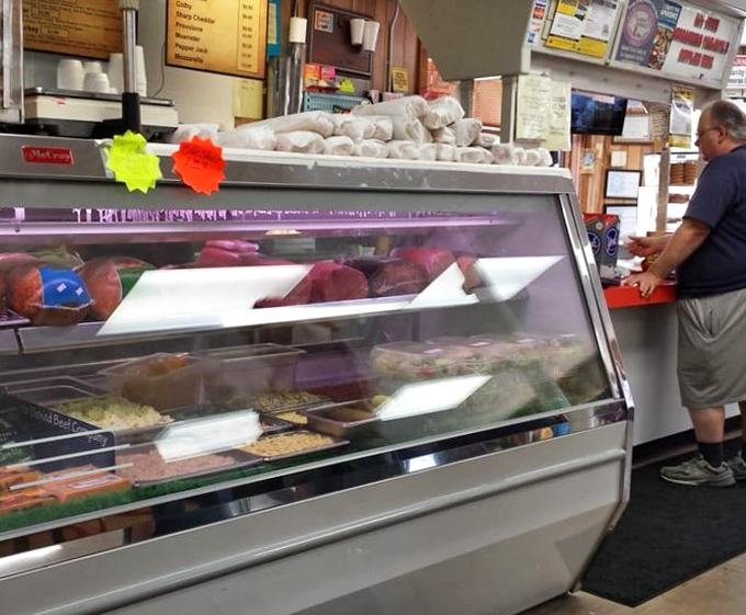 Behind this glass lies the foundation of sandwich greatness &ndash; quality meats and cheeses awaiting their moment of glory.