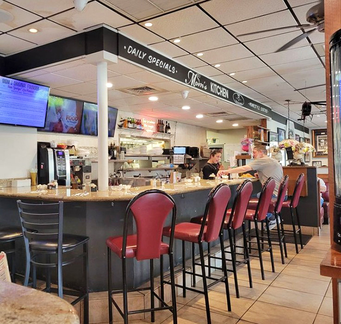 The counter offers front-row seats to the culinary show, where regulars exchange friendly banter with staff who remember not just your order, but your story.