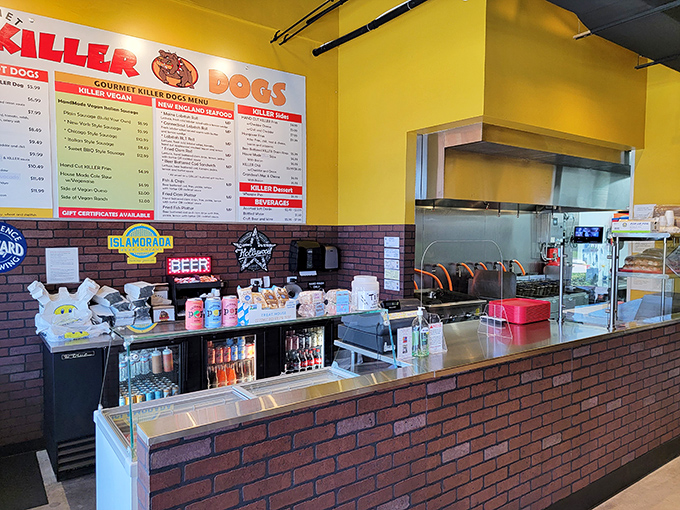 The counter where culinary dreams come true. Yellow walls and brick create a cheerful backdrop for serious food preparation.