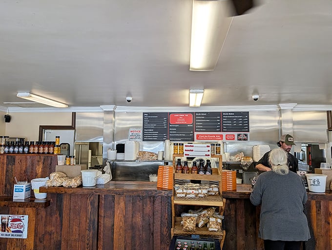 Behind this counter, barbecue alchemy happens daily&mdash;where whole hogs transform into chopped perfection through smoke, time, and generational knowledge.