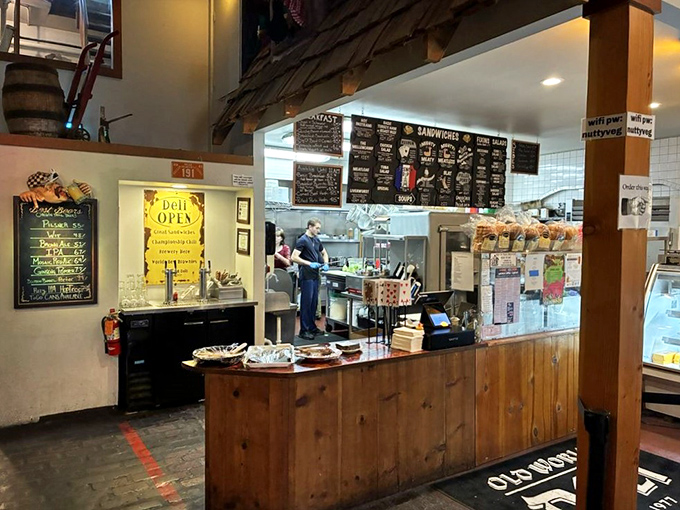 The ordering counter&mdash;where culinary dreams come true. The menu board's handwritten charm hints at the care that goes into every dish.