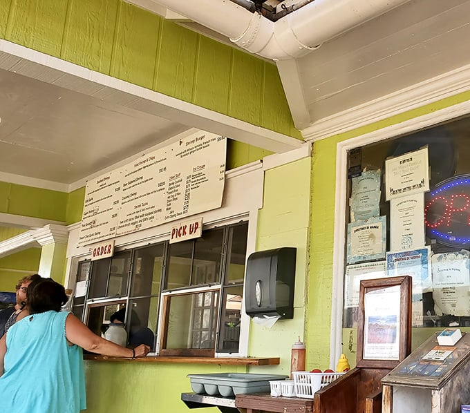 The ordering window &ndash; where dreams are placed and miracles are returned on paper plates.