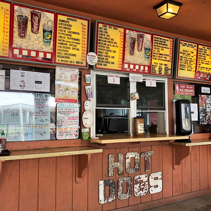 That "HOT DOGS" sign says it all: no pretense, no complications, just honest food served with pride and efficiency.