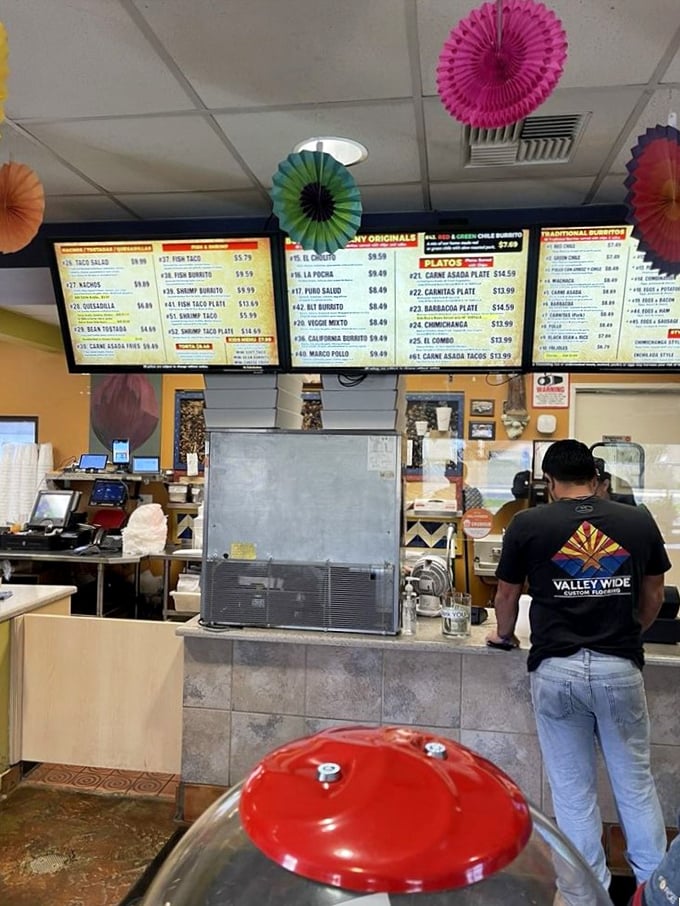 Where culinary dreams are born—watching your order materialize while fighting the urge to add "just one more thing."