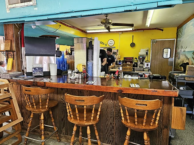 The counter seating offers front-row views to the breakfast ballet &ndash; where orders are called, plates are filled, and morning miracles happen with choreographed precision.