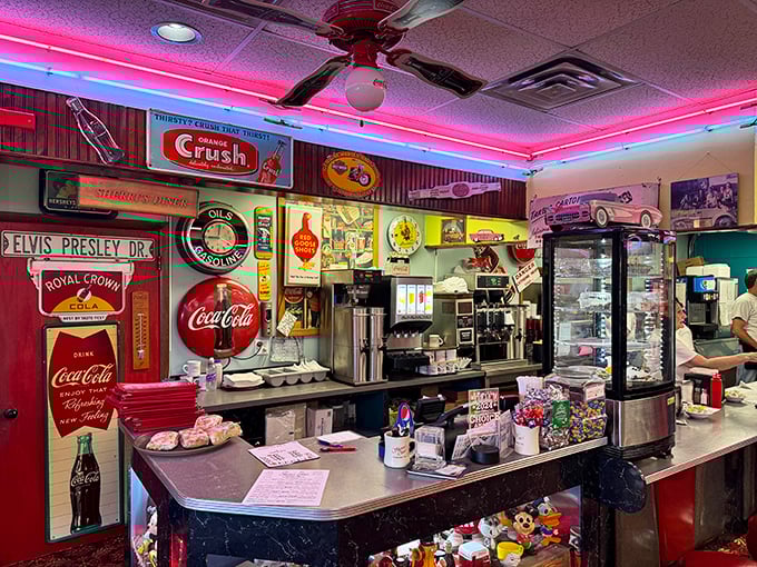 The counter area doubles as a museum of Americana, where Elvis Presley Drive signs and Coca-Cola memorabilia create the perfect backdrop for breakfast.