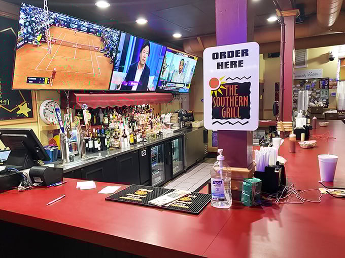 The counter area where orders happen and dreams of pulled pork sandwiches become delicious, smoky, tender reality every single day.