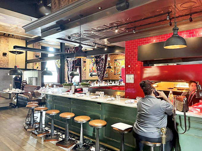 The open kitchen and bar seating let you watch the culinary magic happen. It's dinner and a show without the cheesy singing waiters.