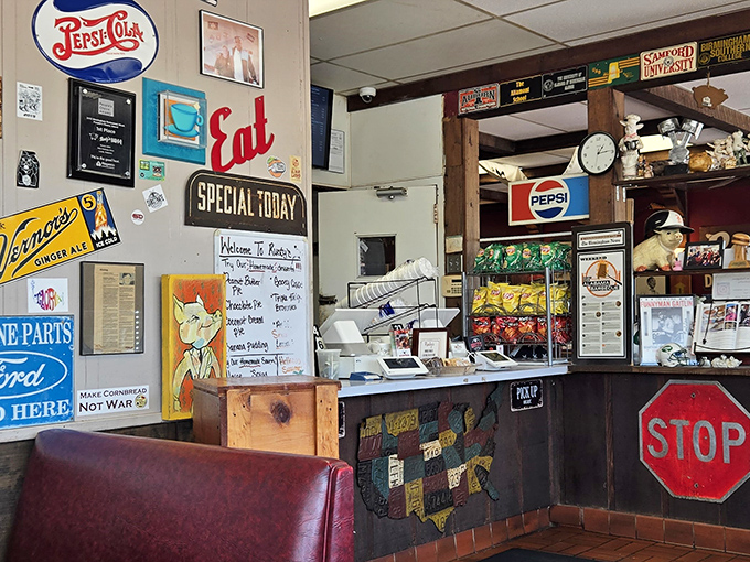 The counter area feels like a museum of Southern nostalgia &ndash; where vintage signs and friendly service create the perfect pre-barbecue anticipation.