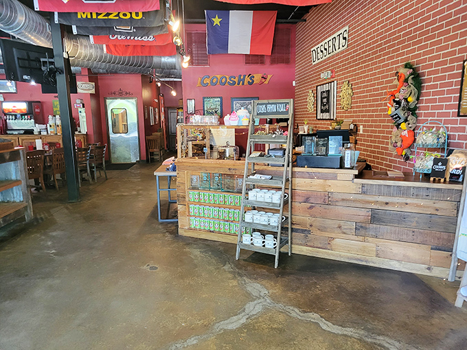 The counter area showcases Coosh's playful spirit&mdash;colorful flags, wooden accents, and a dessert sign that practically begs you to save room.