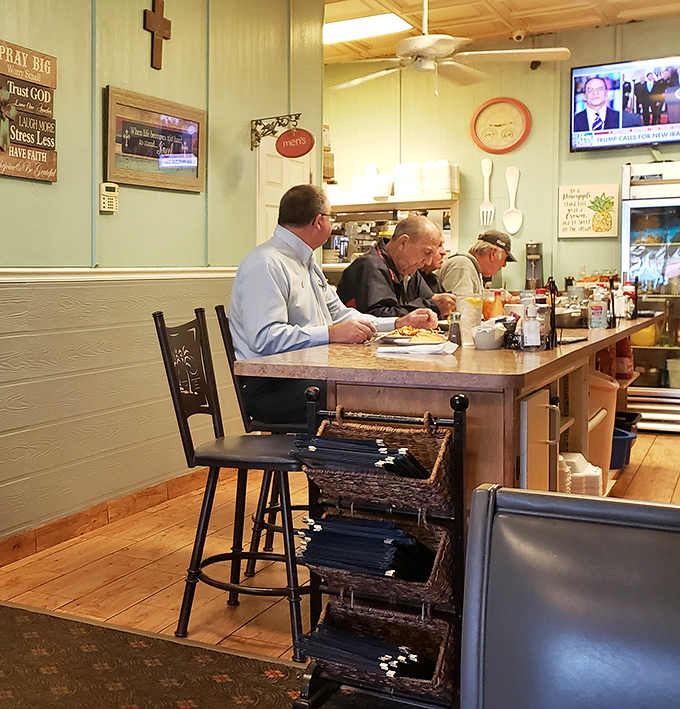 Counter seating: where solo diners become regulars and regulars become family, one cup of coffee at a time.