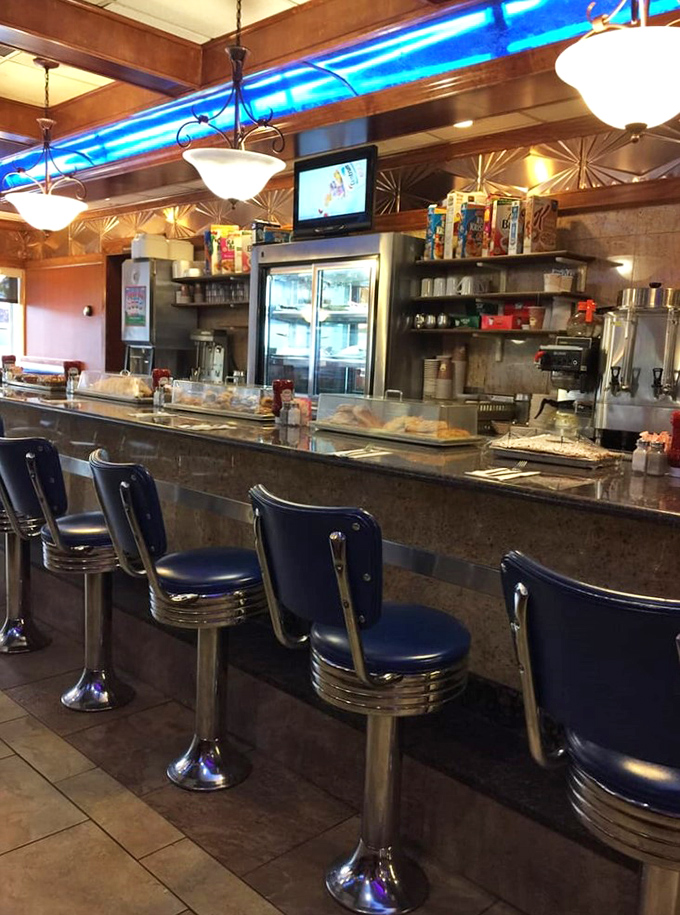 Counter seating: where solo diners become food critics and the choreographed dance of servers and cooks unfolds before your eyes.