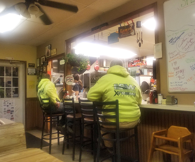 Counter seating offers a front-row view to the breakfast ballet&mdash;workers in high-vis gear fueling up before tackling the day ahead.