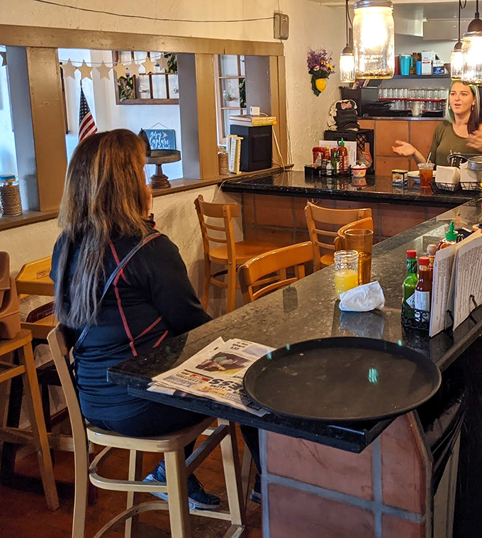 Counter seating where regulars exchange local wisdom and newcomers quickly feel like they've been coming here for years.