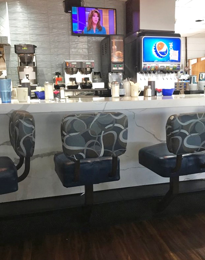 Counter seating: where solo diners become temporary family and coffee refills appear like magic.