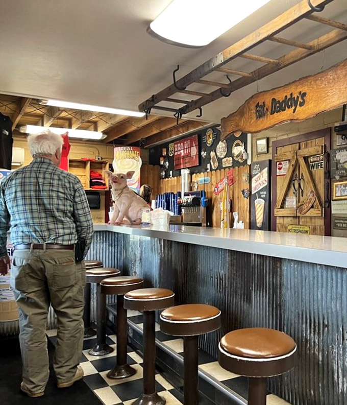At the counter, where barbecue dreams come true, even the pig statue seems to know you're in for something special.
