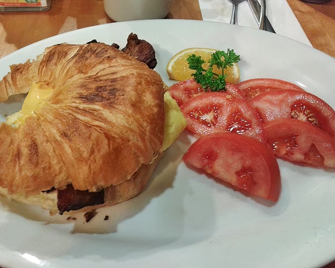 This croissant sandwich with fresh tomatoes is what your sad desk lunch dreams about becoming when it grows up.