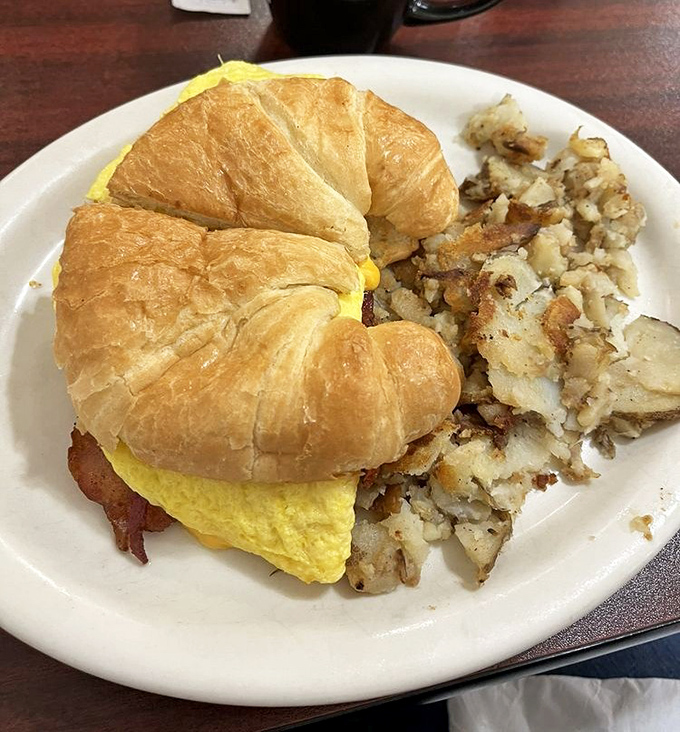 This croissant sandwich doesn't just say "good morning"&mdash;it delivers a full breakfast sermon with eggs as the gospel.