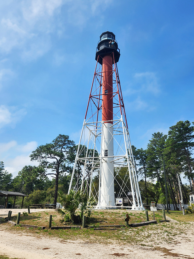 The Crooked River Lighthouse stands tall and proud, like that one relative who refuses to retire and keeps telling the same stories that somehow get better with each retelling.