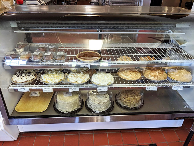 A dessert case that should come with a warning label: "May cause spontaneous happiness and the unbuttoning of pants."