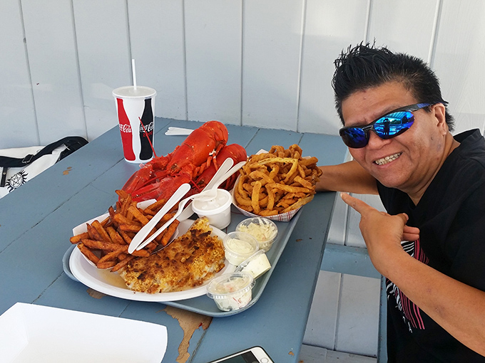 The seafood feast that launched a thousand food dreams. That lobster isn't just dinner &ndash; it's a red-shelled celebrity posing for its delicious close-up.