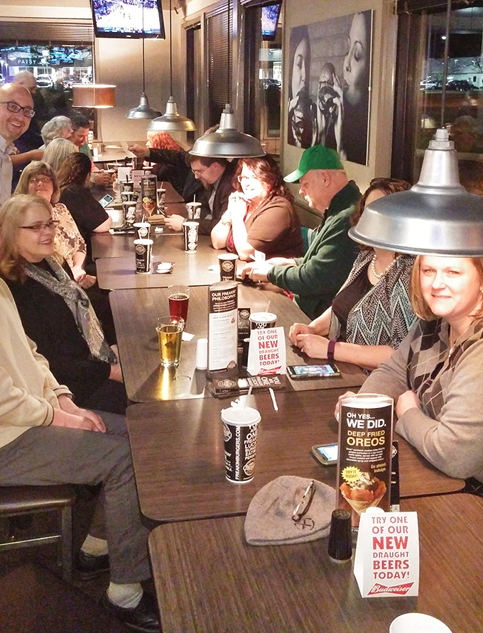 The true measure of a great burger joint: happy diners engaged in that universal ritual of the "silent first bite" followed by animated conversation.