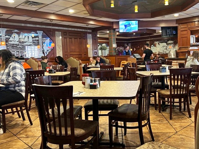 Where strangers become neighbors and neighbors become family. The dining room hums with the symphony of forks meeting plates and coffee being poured.