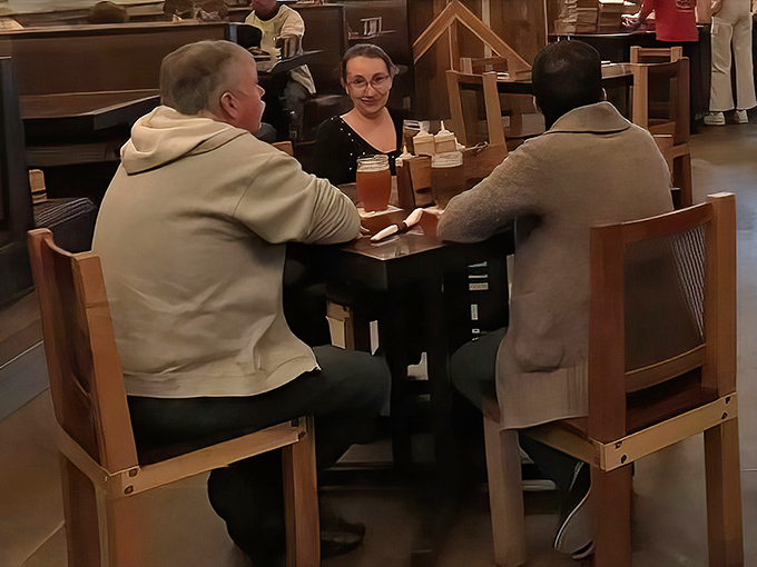 The universal language of barbecue bringing people together. Notice the absence of conversation&mdash;the food is doing all the talking.