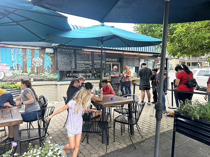 The outdoor patio buzzes with the energy of satisfied diners. Some came for the food, all stayed for the experience.