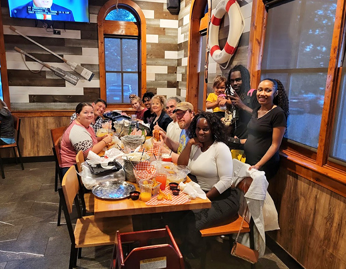 Nothing says "seafood celebration" like a table full of friends wearing bibs and wielding crab crackers with reckless abandon.