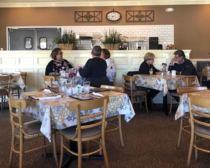 The dining room hums with the satisfied murmurs of regulars. Notice how nobody's on their phone? That's the power of good food.