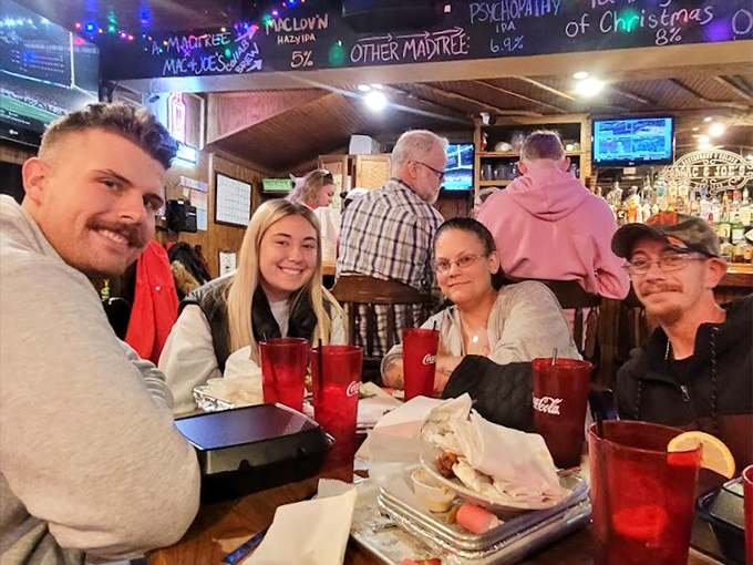 The true measure of a great restaurant: tables filled with people making memories over red cups and good food.