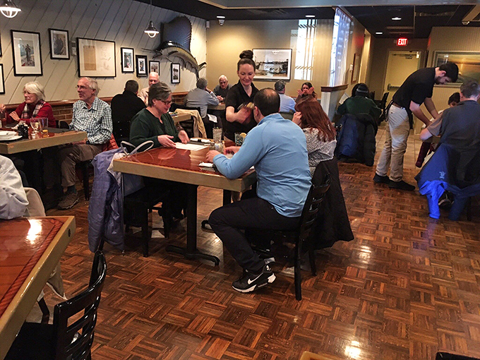 A bustling dining room filled with happy eaters &ndash; the universal language of "mmm" transcending all conversational barriers.