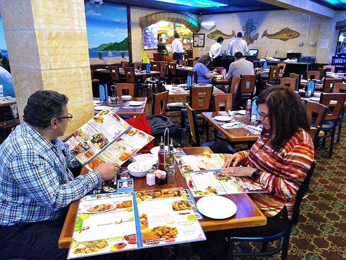Diners poring over menus like they're studying for finals—the right seafood choice is serious business in these parts.