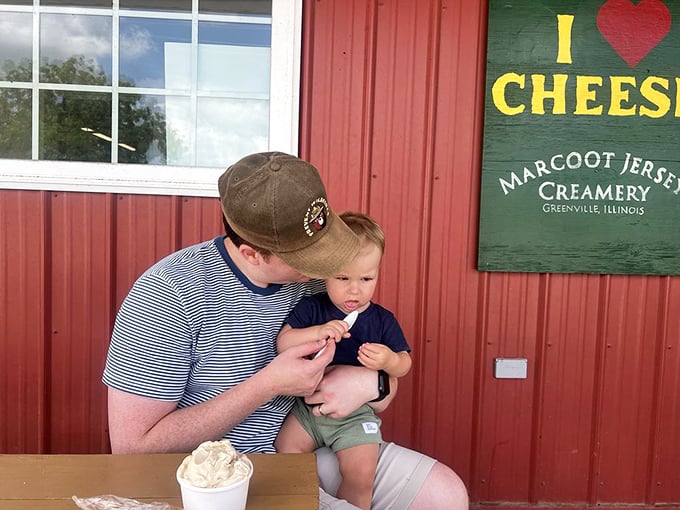 The magical moment of a child's first taste of farm-fresh ice cream. That look of concentration says it all!