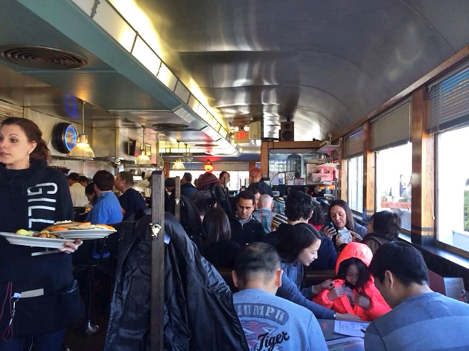 Happy diners proving that breakfast really is the most important meal for group therapy.
