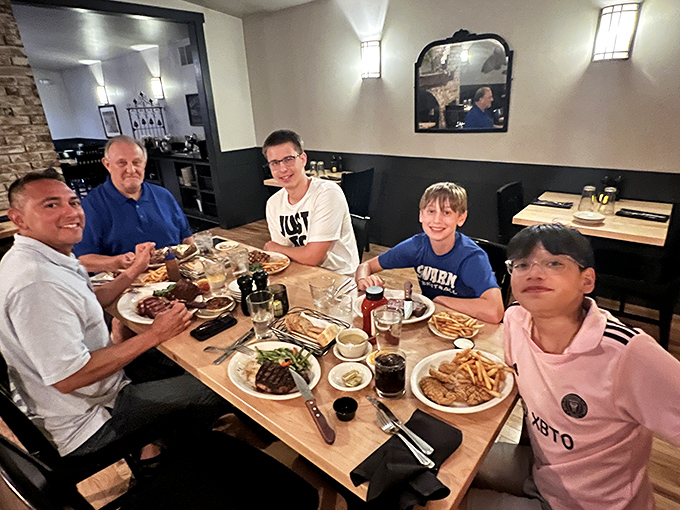 Family gathering where everyone's actually smiling - must be the food, not the conversation about politics.