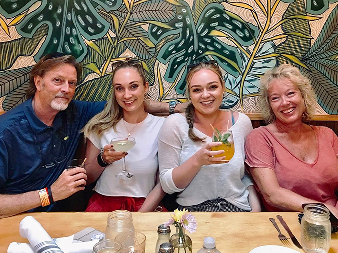 The restaurant's vibrant mural provides the perfect backdrop for creating memories that will last longer than your restraint around dessert.