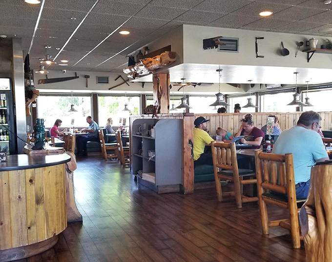 A dining room where strangers become temporary breakfast companions, united by the universal language of "pass the syrup, please."