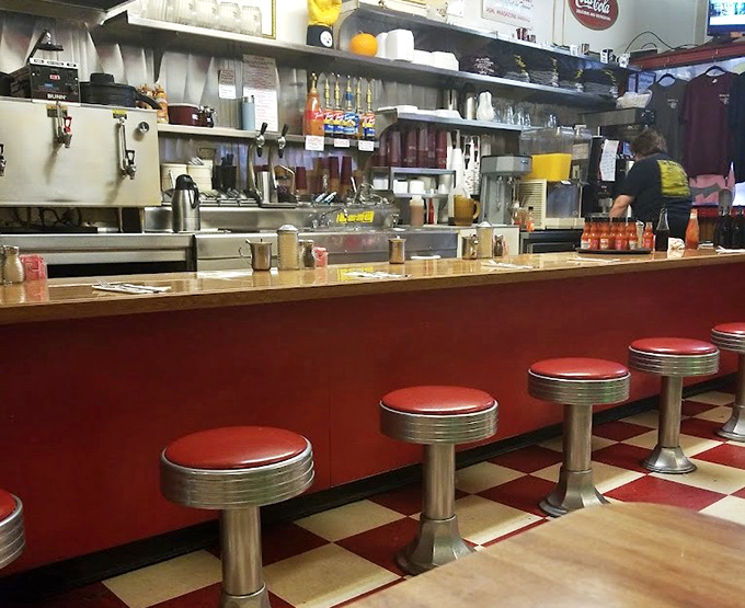 The counter seating offers front-row tickets to the greatest show in breakfast&mdash;a symphony of sizzles, flips, and short-order magic.