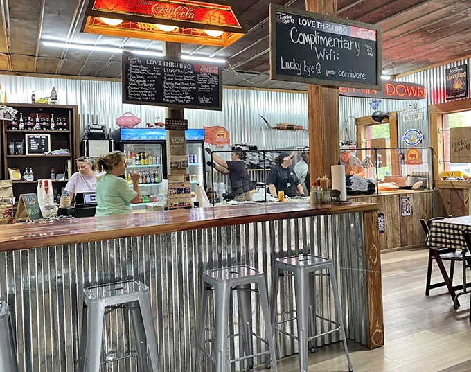 The counter where barbecue dreams come true, complete with corrugated metal that's seen more smoke than a 1970s rock concert. Order with confidence.