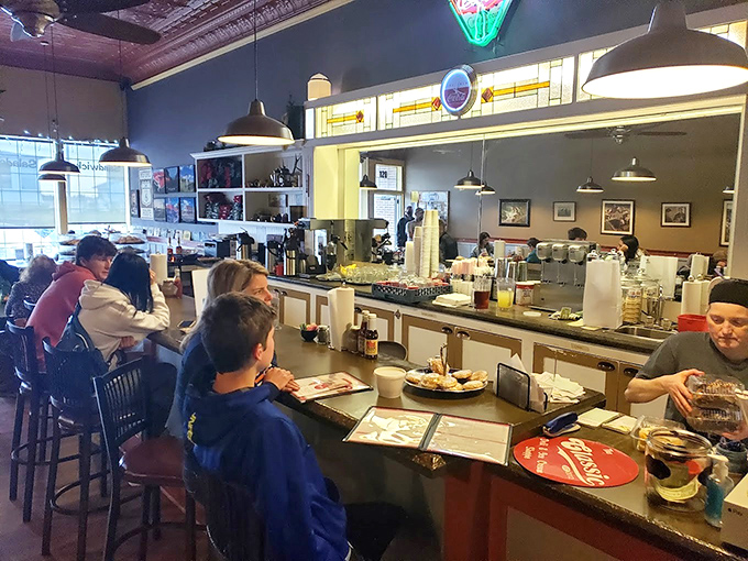 The counter where magic happens daily. Notice how even the pendant lights seem to be spotlighting the culinary performance about to unfold.