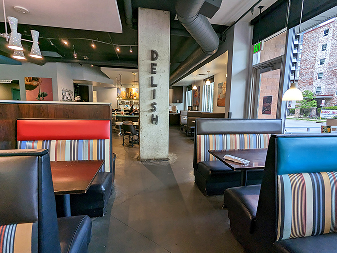 Booths that invite you to settle in and stay awhile. The striped upholstery says "fun" while the comfort says "order another round.