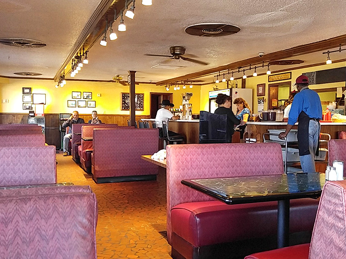 The dining room hums with the symphony of clinking forks, coffee cups, and conversations that have been ongoing for decades.