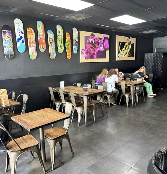 The dining area feels like a secret anime clubhouse. Skateboard decks and artwork transform what could be ordinary into something extraordinary.
