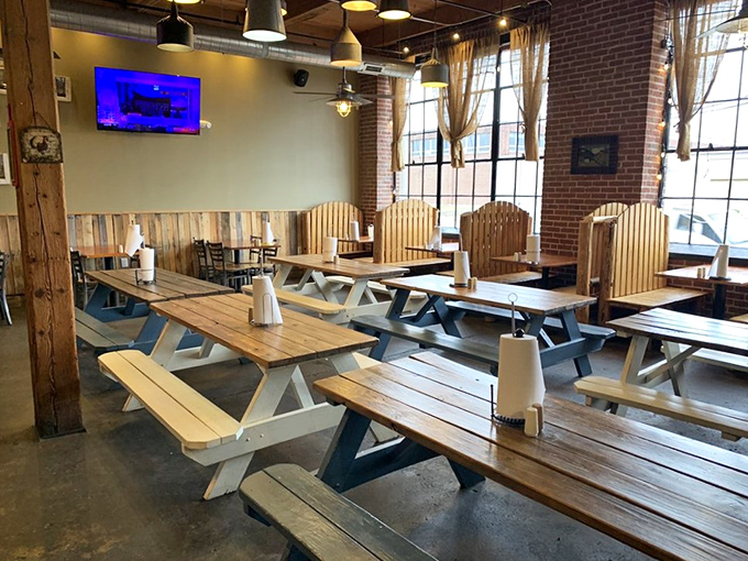 The dining room &ndash; where wooden picnic tables invite strangers to become friends over a shared love of smoked meats.