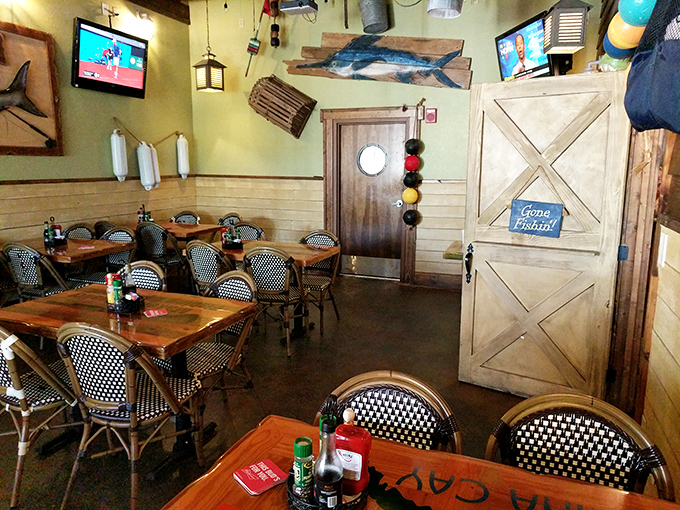 Nautical nostalgia meets dining comfort. The "Gone Fishin'" door and maritime accents create an atmosphere that's both playful and relaxing.