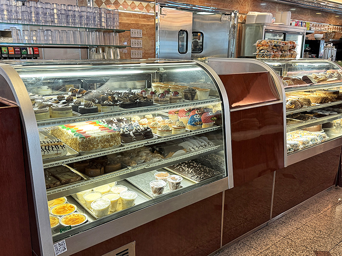 The display case that's responsible for countless broken diet resolutions—a glass-enclosed gallery of temptation that no willpower can withstand.