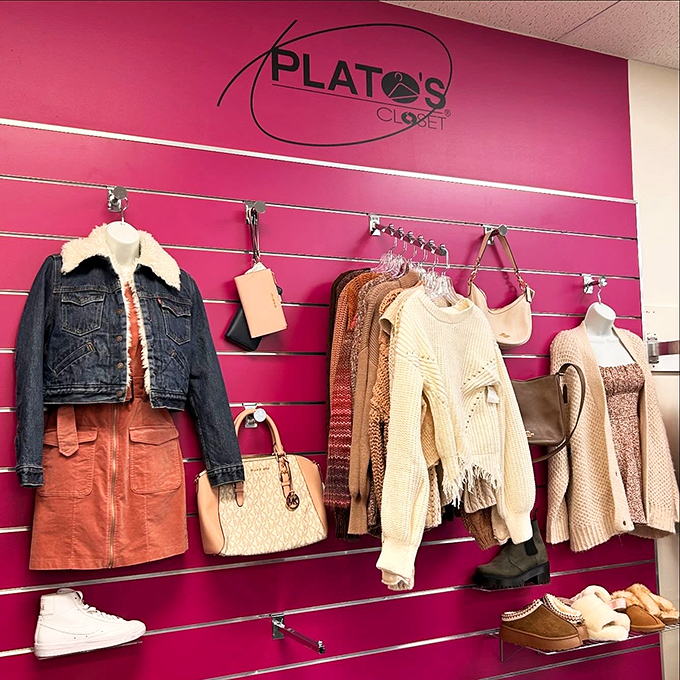 Fashion vignettes that inspire outfit creativity. This pink wall display showcases curated looks that whisper, "You could pull this off too."