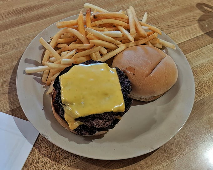 Cheeseburger and fries&mdash;the dynamic duo of American comfort food. That perfectly melted cheese blanket is the superhero cape this hand-formed patty deserves.